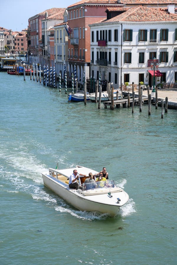 Venice. a Boat on the Water, with Tourists Editorial Stock Image ...