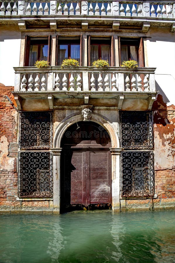 Venice Door with Canal stock photo. Image of scenics - 104418052