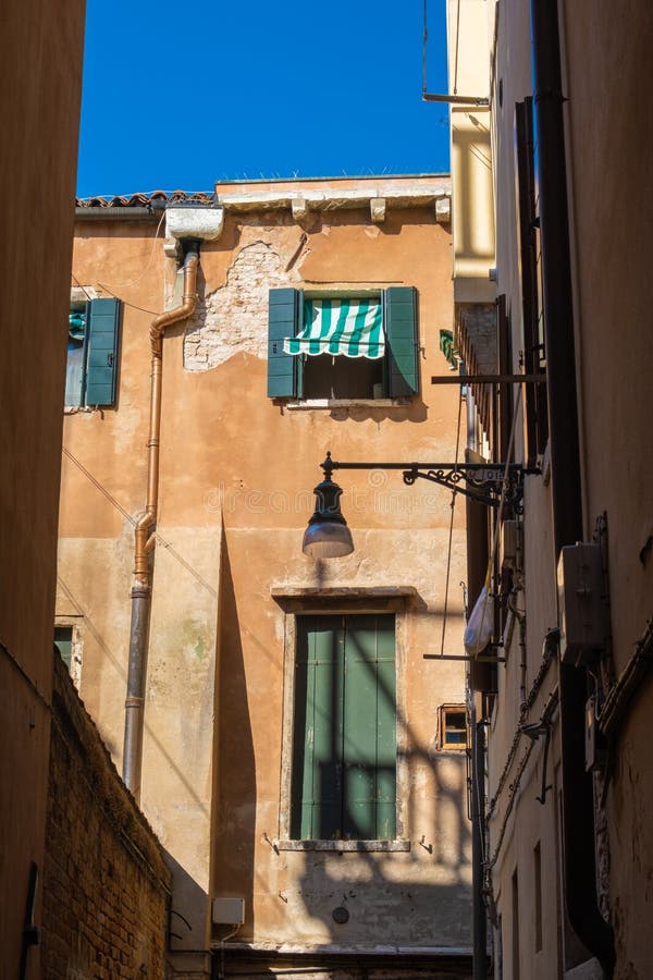 VENICE, ITALY - August 27, 2021: View of Windows and Doors of Houses on ...
