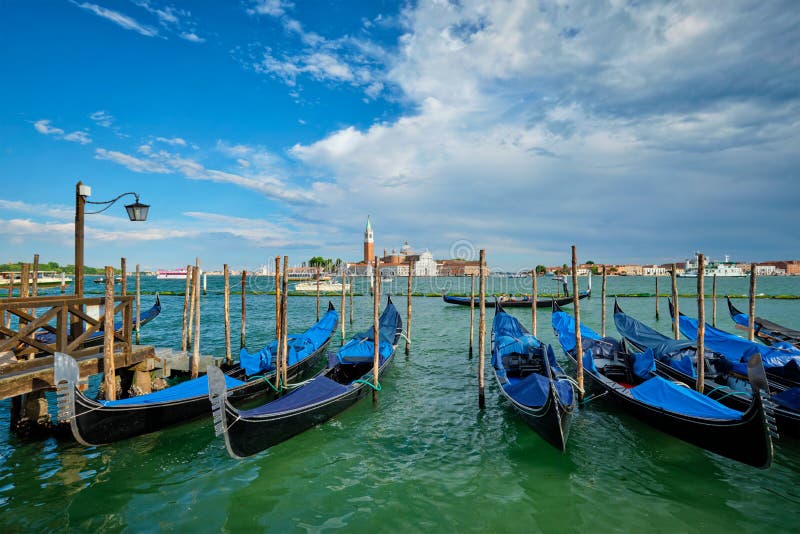 Gondolas And In Lagoon Of Venice By Saint Mark San Marco Square