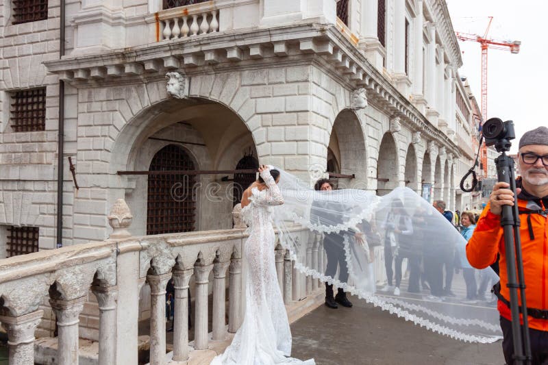 An Unknown Model Poses in Front of the Bridge of Sighs in Venice ...