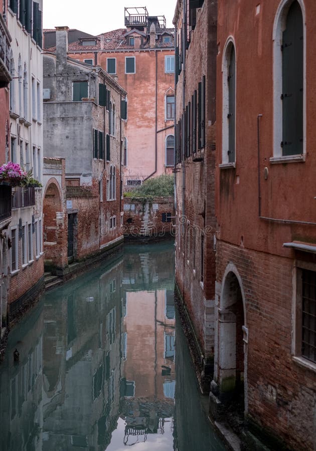 Typical Canal Scene in Venice with Reflection in the Water. Stock Image ...