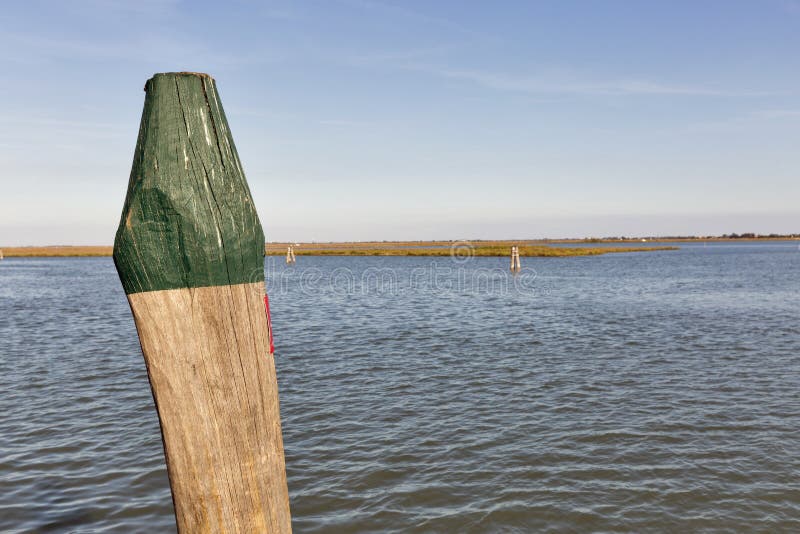 Venice Lagoon with Wooden Piles for Navigation Stock Image - Image of ...