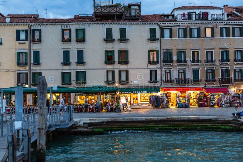 Venice Waterfront at Night editorial photography. Image of sidewalk ...