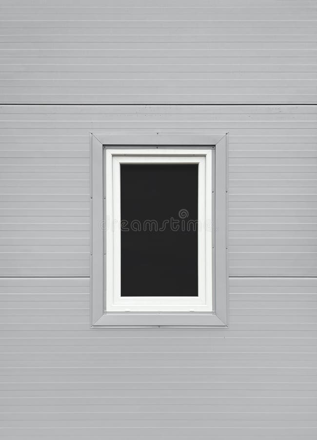Ventana Rectangular En Un Marco Blanco Sobre La Fachada De Un Edificio ...
