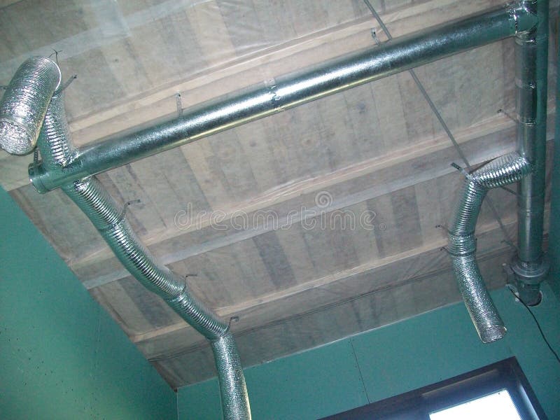Ventilation Ducts and Pipes Installed on the Ceiling of a Green Room in ...