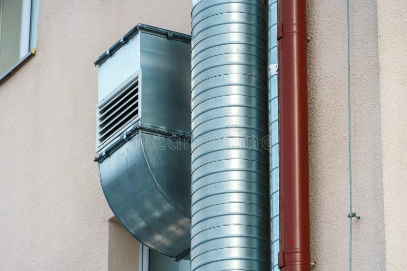 Ventilation Pipes on the Facade of the Building. Metal Pipes Covered ...
