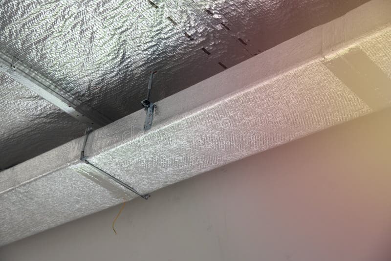 Ventilation Pipes in Silver Insulation Material on Ceiling Stock Image ...
