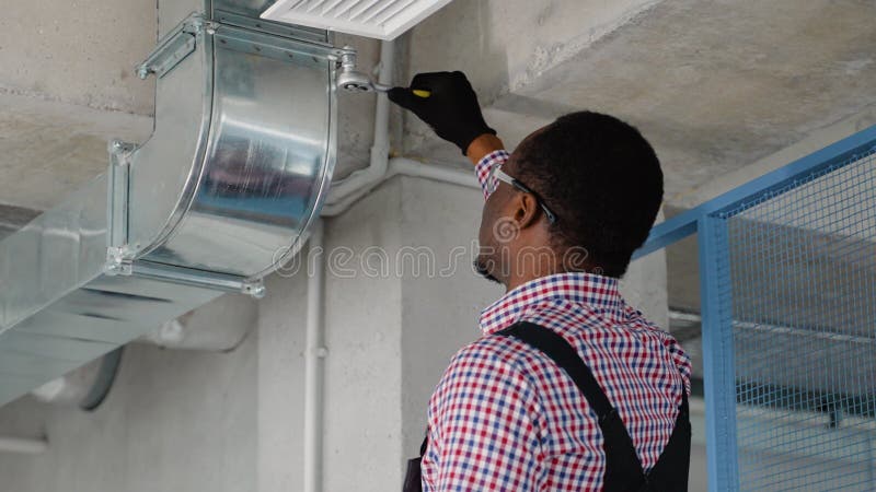 African Hvac Worker Install Ducted Pipe System for Ventilation and Air ...