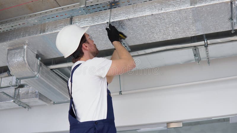 Hvac Worker Install Ducted Pipe System for Ventilation and Air ...
