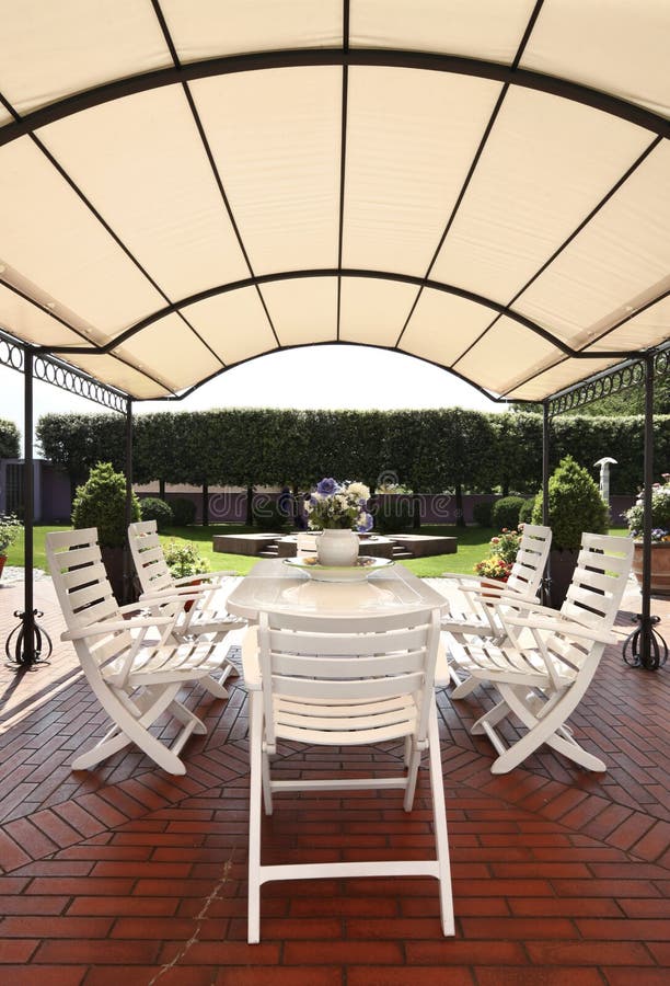 Veranda, table and chair stock photo. Image of patio - 19636614