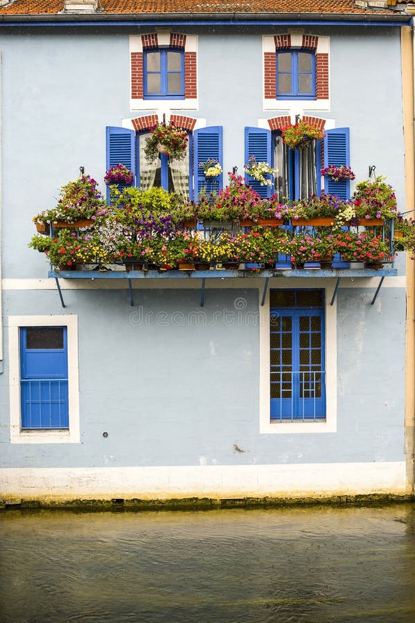 Verdun - House with Flowers on the River Stock Image - Image of river ...