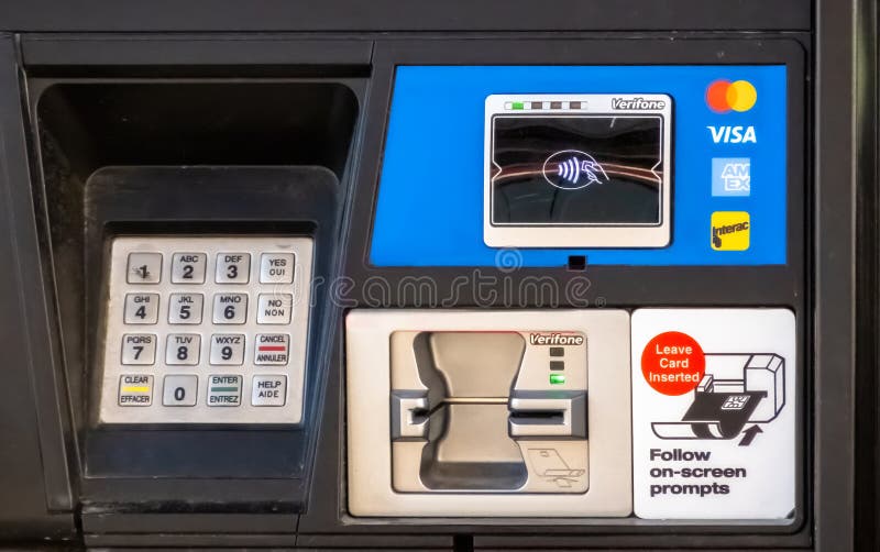 A Verifone Payment Terminal at a Gas Pump, Featuring a Keypad, Card ...
