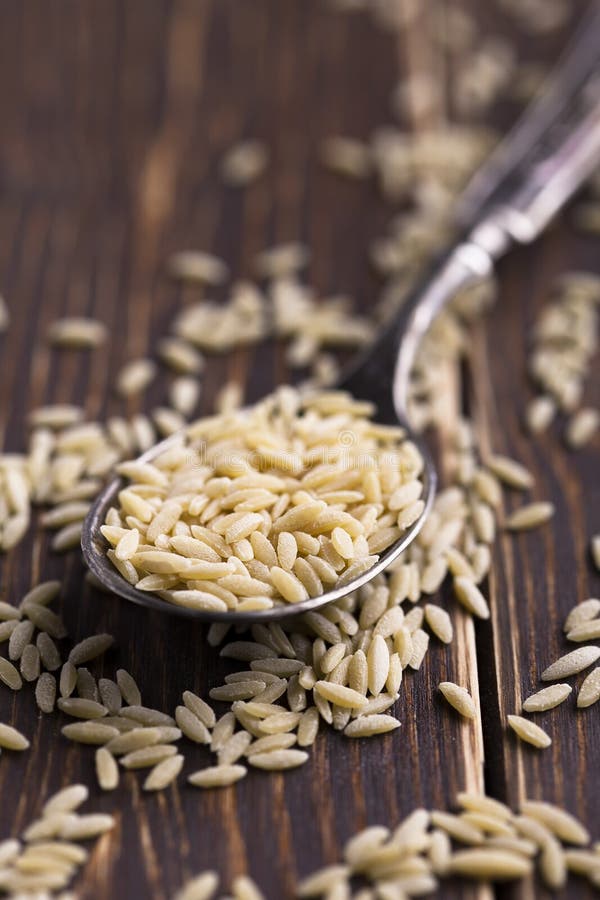 Vermicelli Pieces in a Spoon on a Wooden Background Stock Photo - Image ...