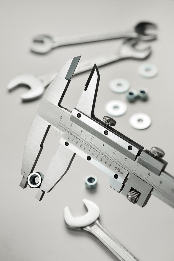 Caliper Measuring a Tool with a Caliper Stock Image - Image of engineer ...