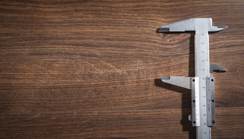 Vernier Caliper on the Wooden Background Stock Photo - Image of caliper ...