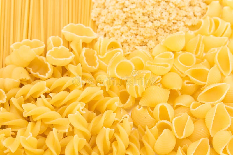Versatile Italian Pasta a Pile Stock Photo - Image of wheat, italian ...