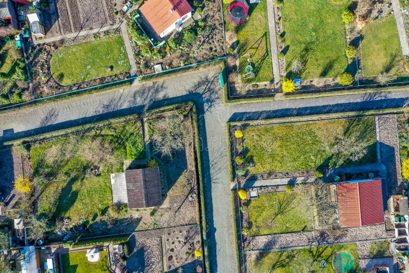 Vertical Aerial View of an Allotment Garden with Huts, Garden and Paths ...