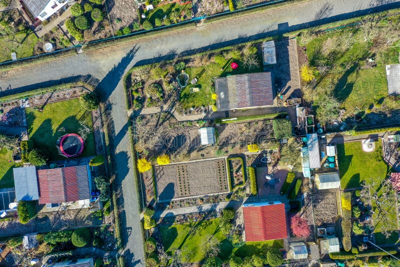 Vertical Aerial View of an Allotment Garden with Huts, Garden and Paths ...