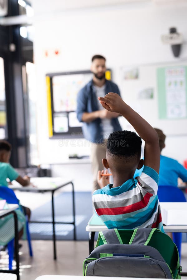 Vertical of Diverse Male Teacher and Schoolchildren Studying Skeleton ...