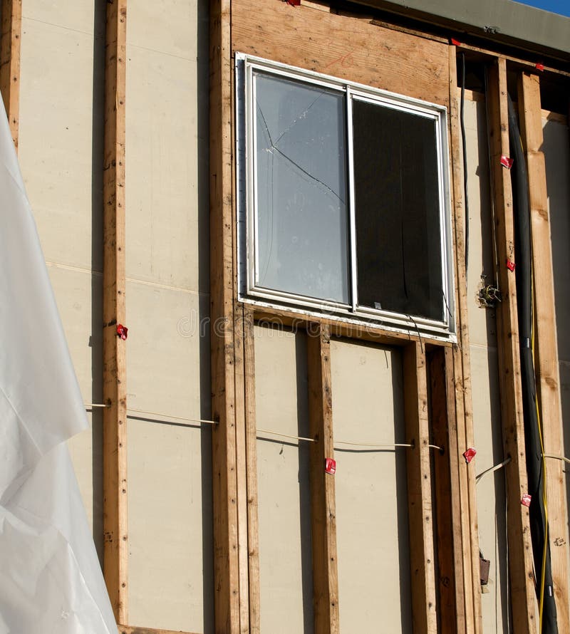Angled View Two Windows Under Construction with Framework Stock Image ...