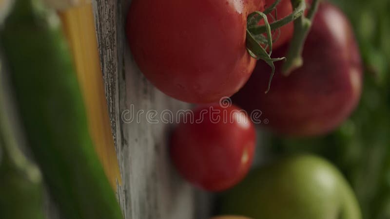 Vertical of Anonymous Person Taking Tomatoes from Table Stock Video ...