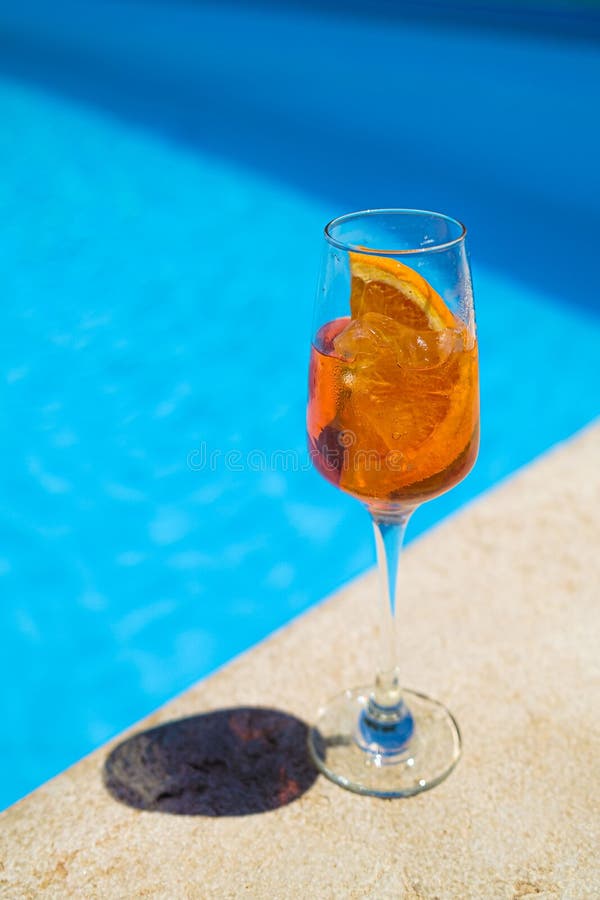 Vertical of Aperol Spritz Drink on Poolside. Stock Image - Image of ...