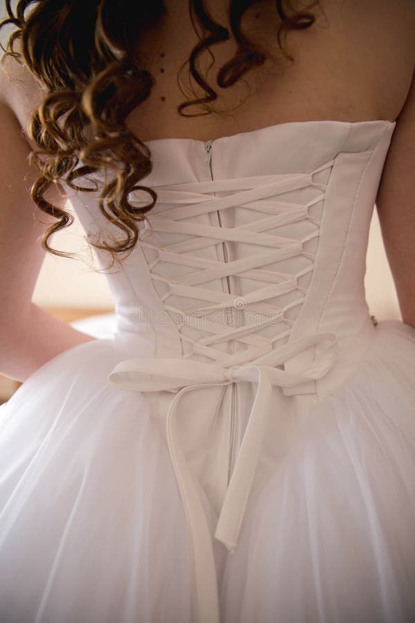 Vertical Back View of a Bride in a Dress with a Corset Back Stock Photo ...
