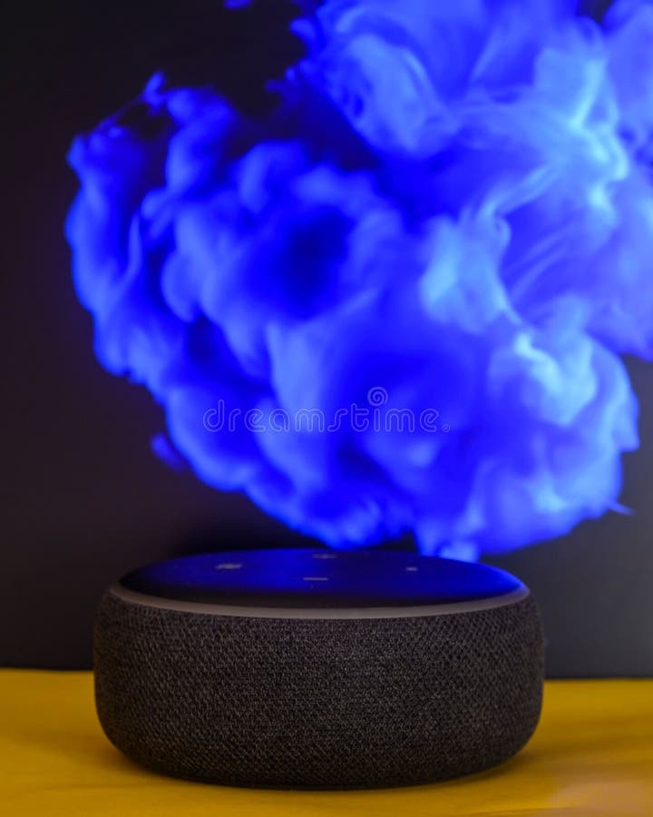 Vertical of the Black Amazon Echo Dot with Alexa Assistant with a ...