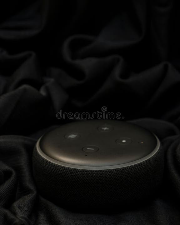 Vertical of the Black Amazon Echo Dot with Alexa Assistant Isolated on ...