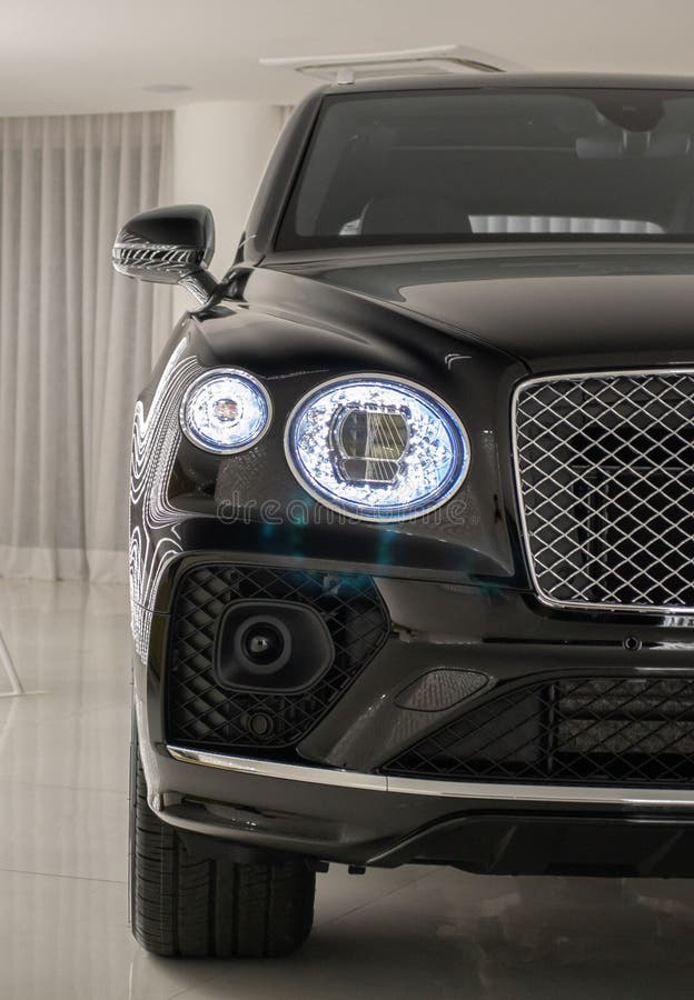 Vertical of Black Bentley Bentayga Front View with Headlights on ...