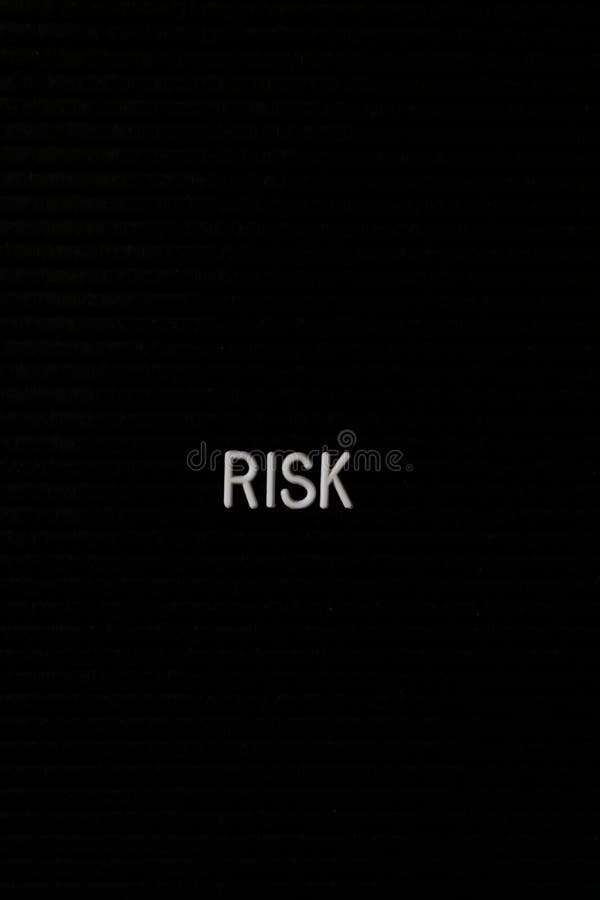 Vertical Black Spongy Board with a Text "risk" for Background Stock ...