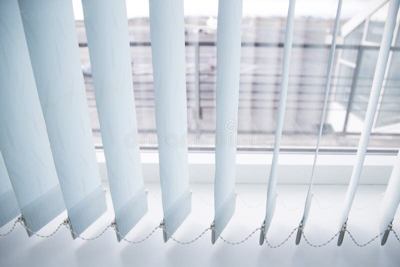 Vertical Blinds for Windows.Vertical Blinds in the Office Stock Photo ...