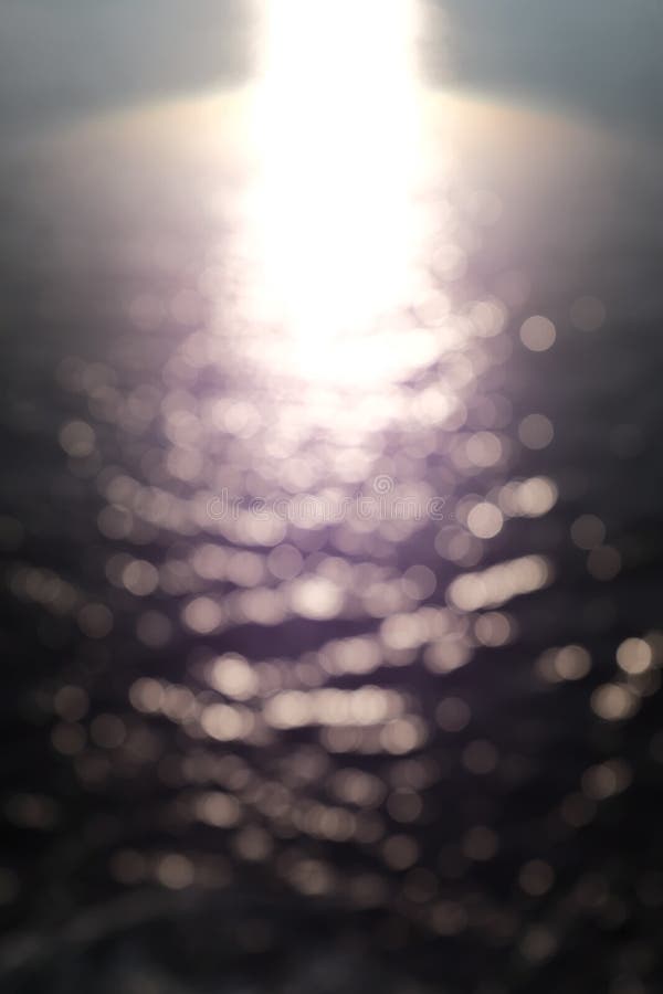 Vertical Blurry Shot of the Sun Reflected in the Water Stock Image ...