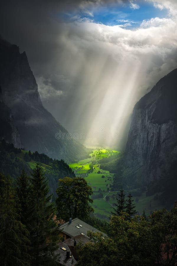 Vertical Breathtaking Scenery of the Sun Rays Shining through the ...