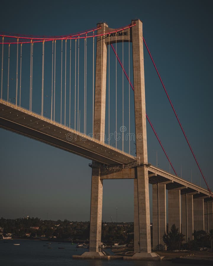 Vertical of a Bridge Against the Evening Sky Stock Photo - Image of ...
