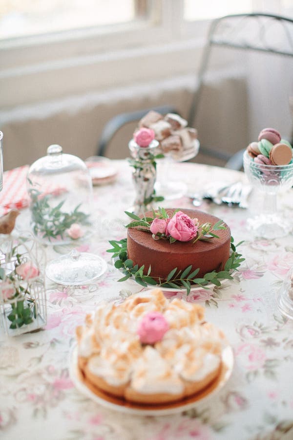 Vertical of Cake Table with Chocolate Cake in the Selective Focus Stock ...