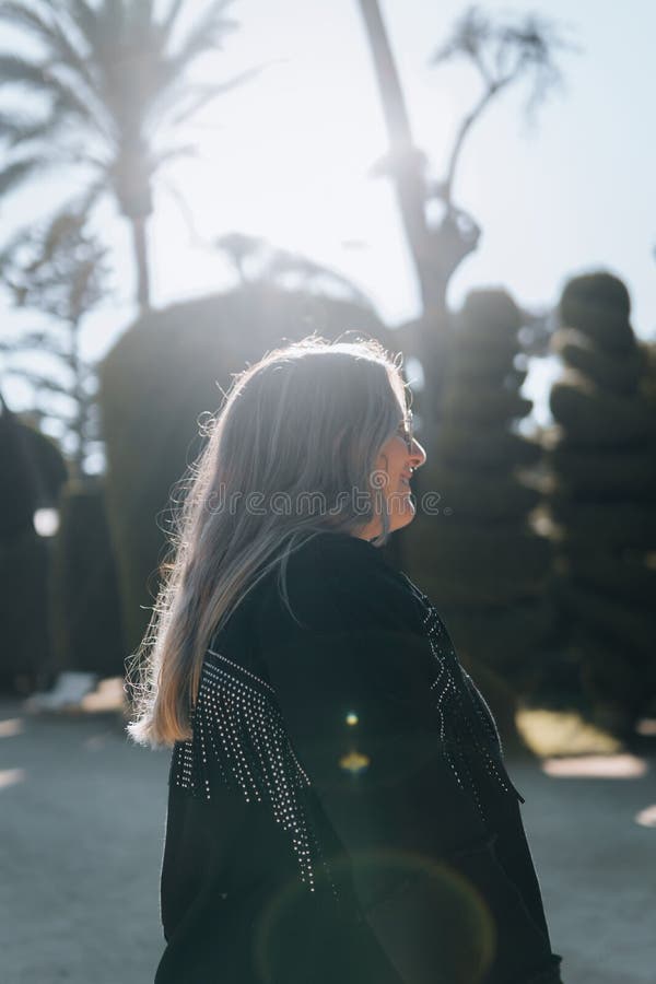 Vertical of a Caucasian Woman S Profile in the Park. Stock Image ...