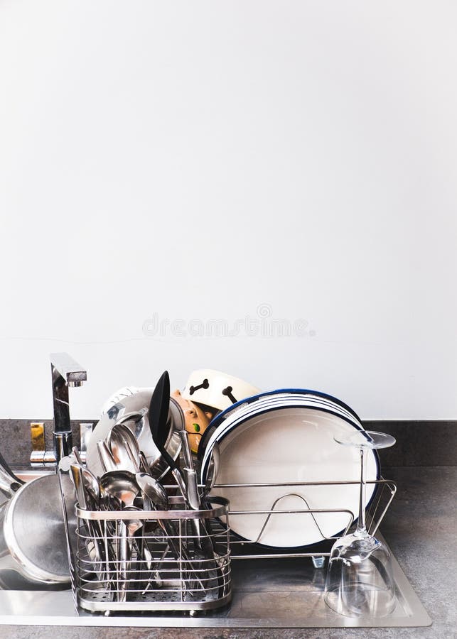 Vertical of Clean Dishes Drying after Washing. Stock Photo - Image of ...