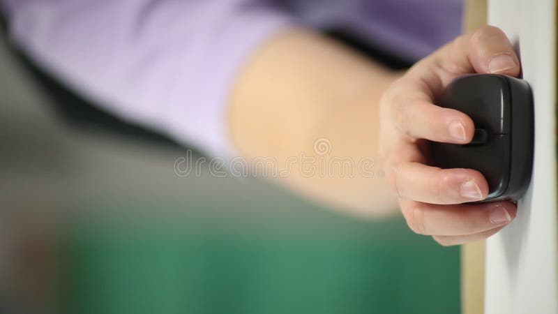 Vertical-Click Black Computer Mouse on a Work Desk. Working with a PC ...