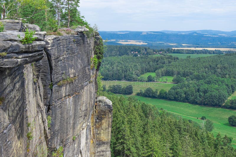 Vertical Cliffs, a Valley with Trees, Fields and Small Villages Stock ...