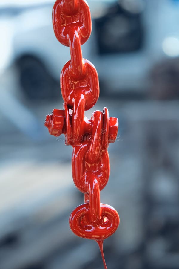 Closeup of New Chain Link Painted with Red Paint. Chain with Paint ...