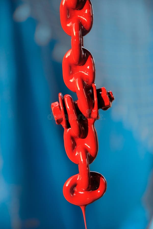 Vertical Close-up of New Chain Link Painted with Red Paint. Chain with ...