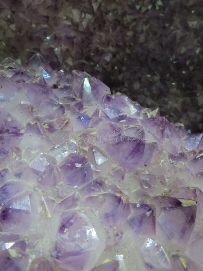 Vertical Closeup of Beautiful Purple Amethyst Crystal Formations in an ...
