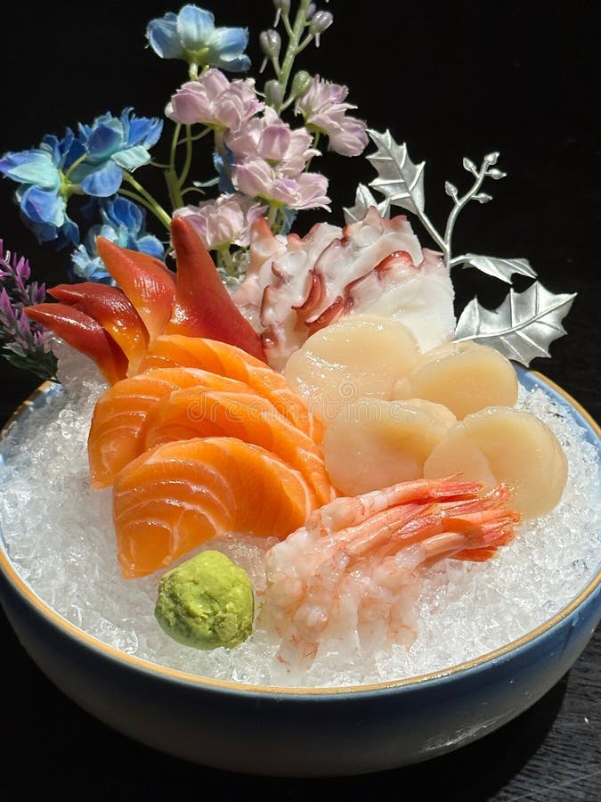 Vertical Closeup of a Bowl Filled with Seafood and Ice Stock Photo ...