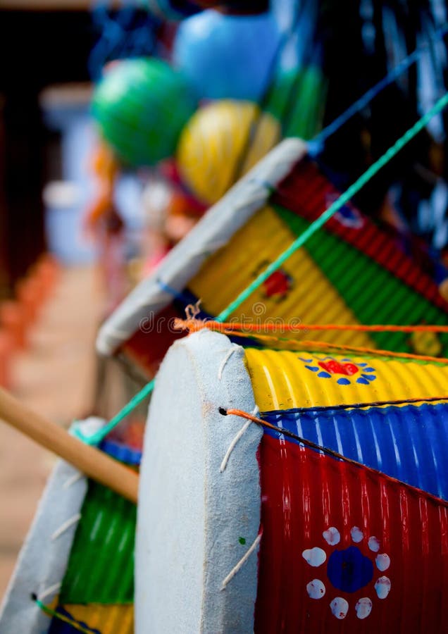 Vertical Closeup of Colorful Drums Hanging in a Row Stock Image - Image ...
