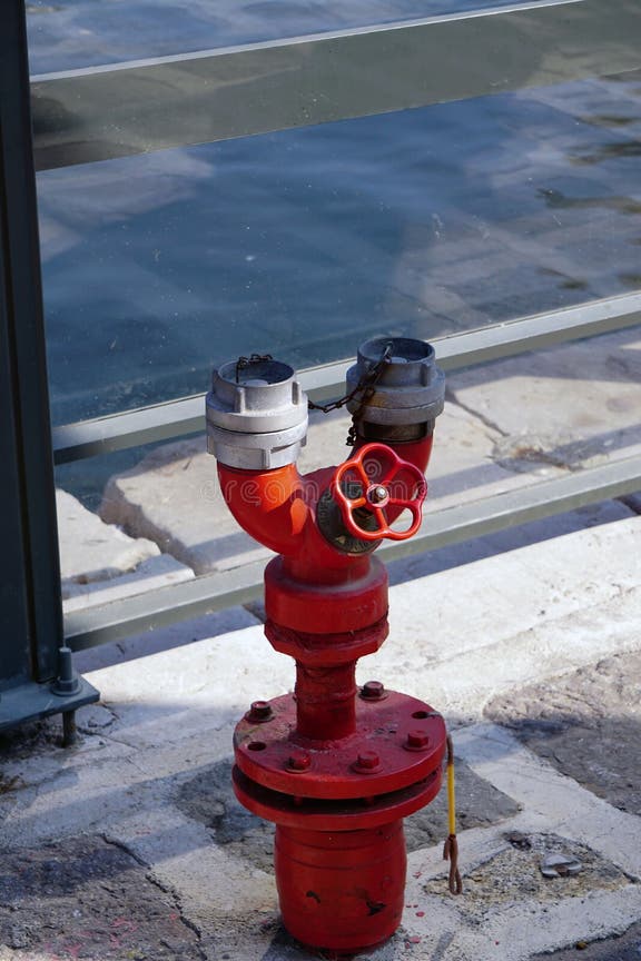 Vertical Closeup of a Fire Plug on a Sidewalk Stock Image - Image of ...
