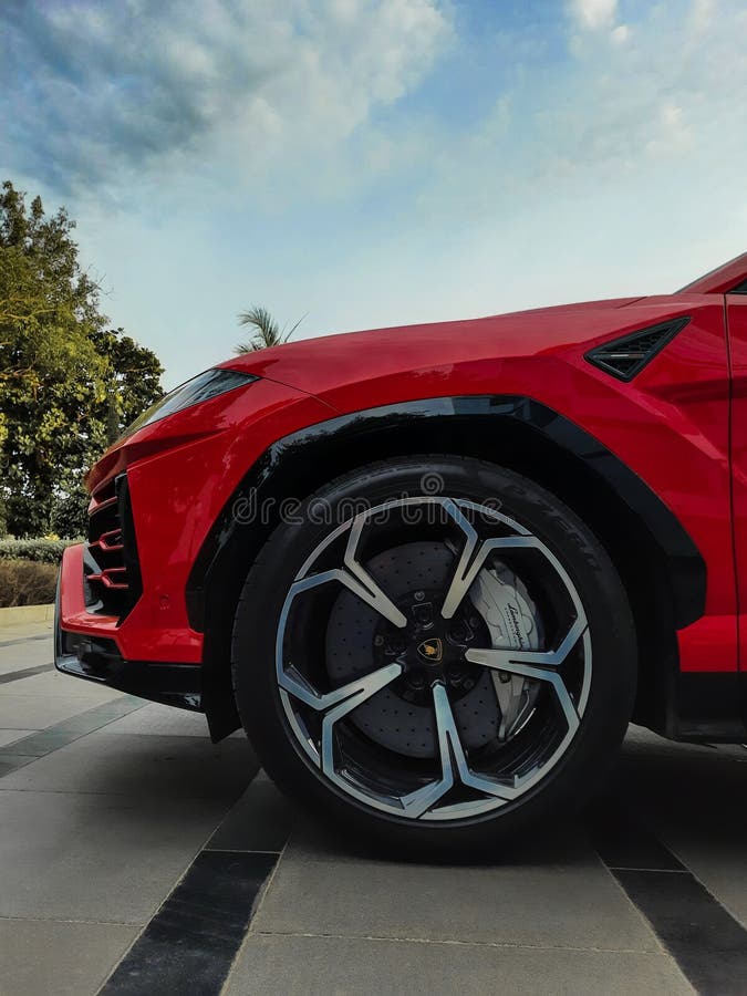 Vertical Closeup of the Front Side of a Red Lamborghini Urus. Editorial ...