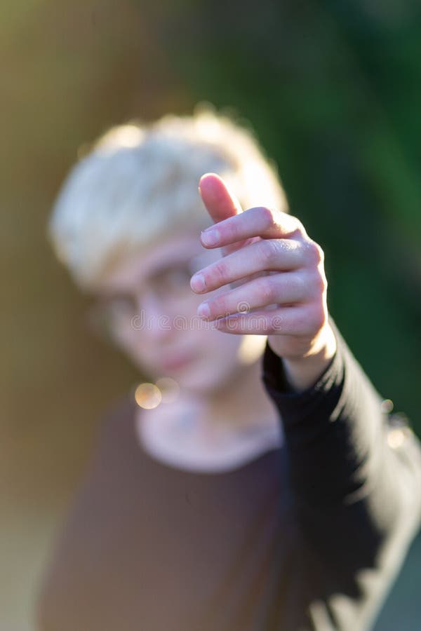 Vertical Closeup of a Girl Holding Out Her Hand. Stock Photo - Image of ...