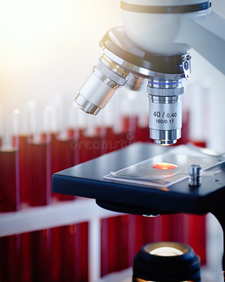 Closeup Microscope Lens on Gray Background in Laboratory Stock Photo ...
